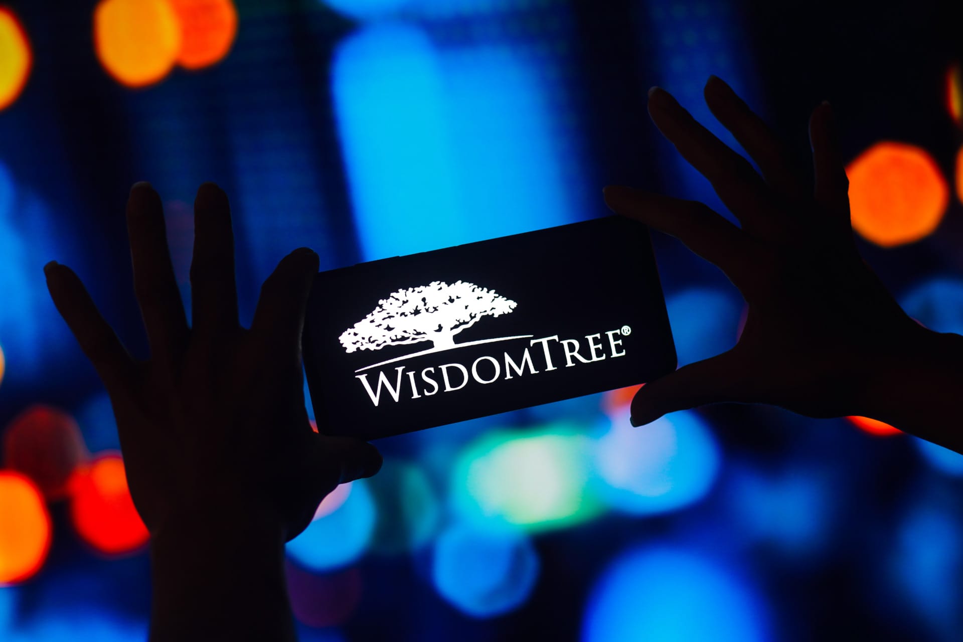 WisdomTree Rolls Out New Crypto App in New York Despite Shareholder ...